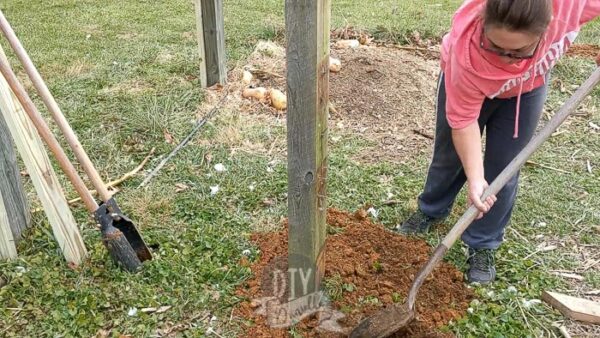 How to Dig a Fence Post Hole by Hand - DIY Danielle®