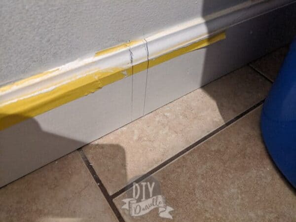 How to Cut Baseboard on the Wall - DIY Danielle®