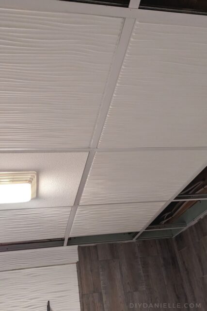 How to Install Drop Ceiling Tiles for a Bathroom - DIY Danielle®